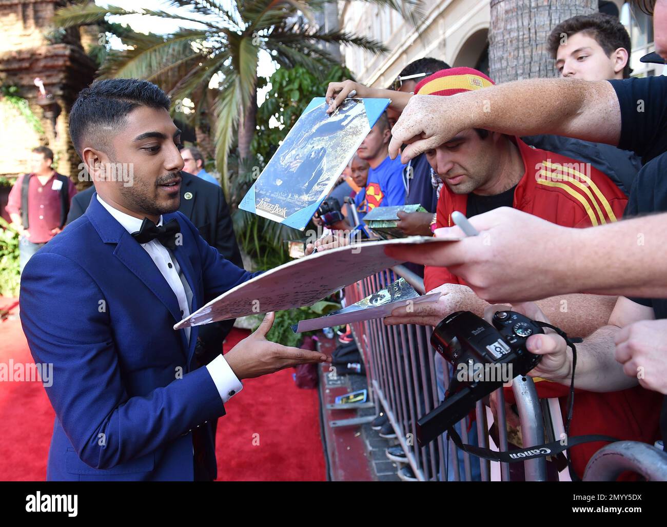 Ritesh Rajan signs autographs at the premiere of "The Jungle Book" at ...