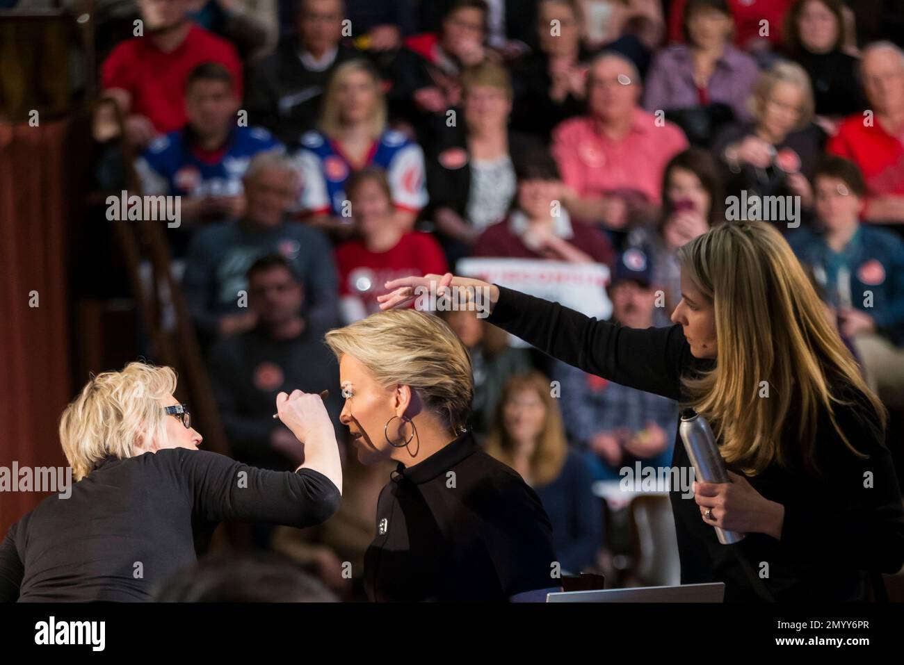 Hair and makeup is prepared for Fox News host Megyn Kelly, center ...