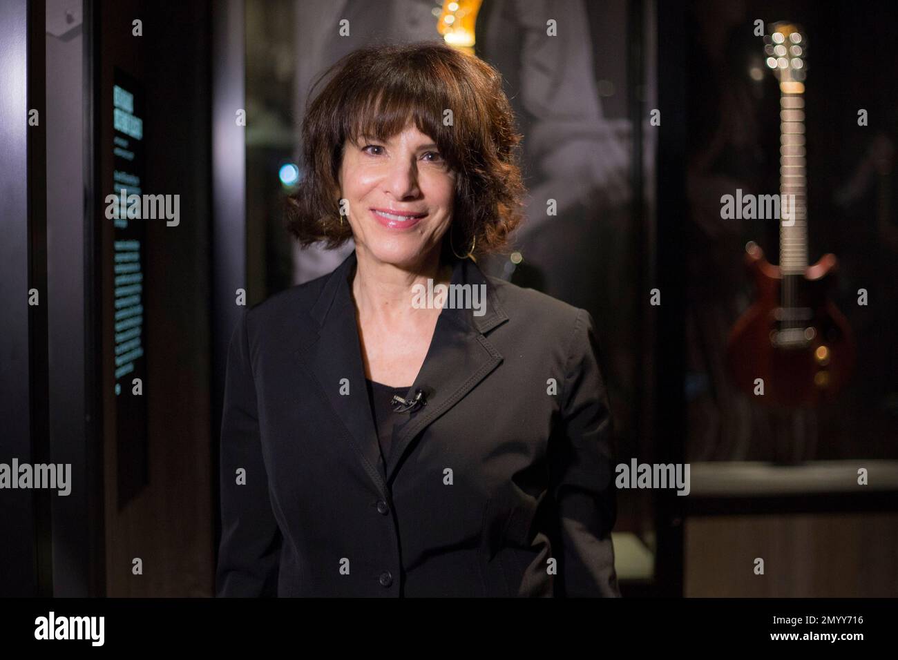 Lead curator, Ileen Gallagher is photographed as part of Exhibitionism ...