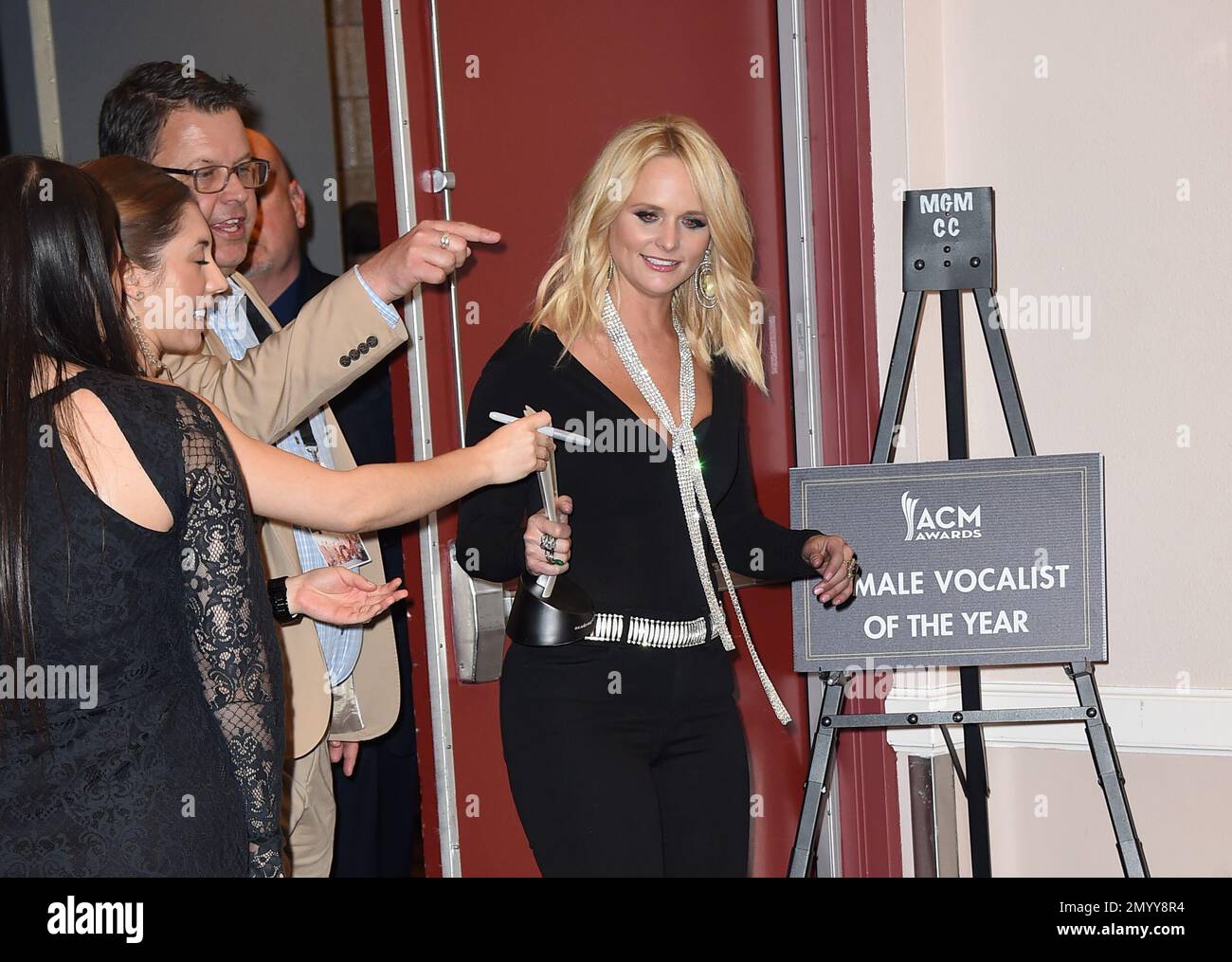 Miranda Lambert poses in the press room with the awards for female ...