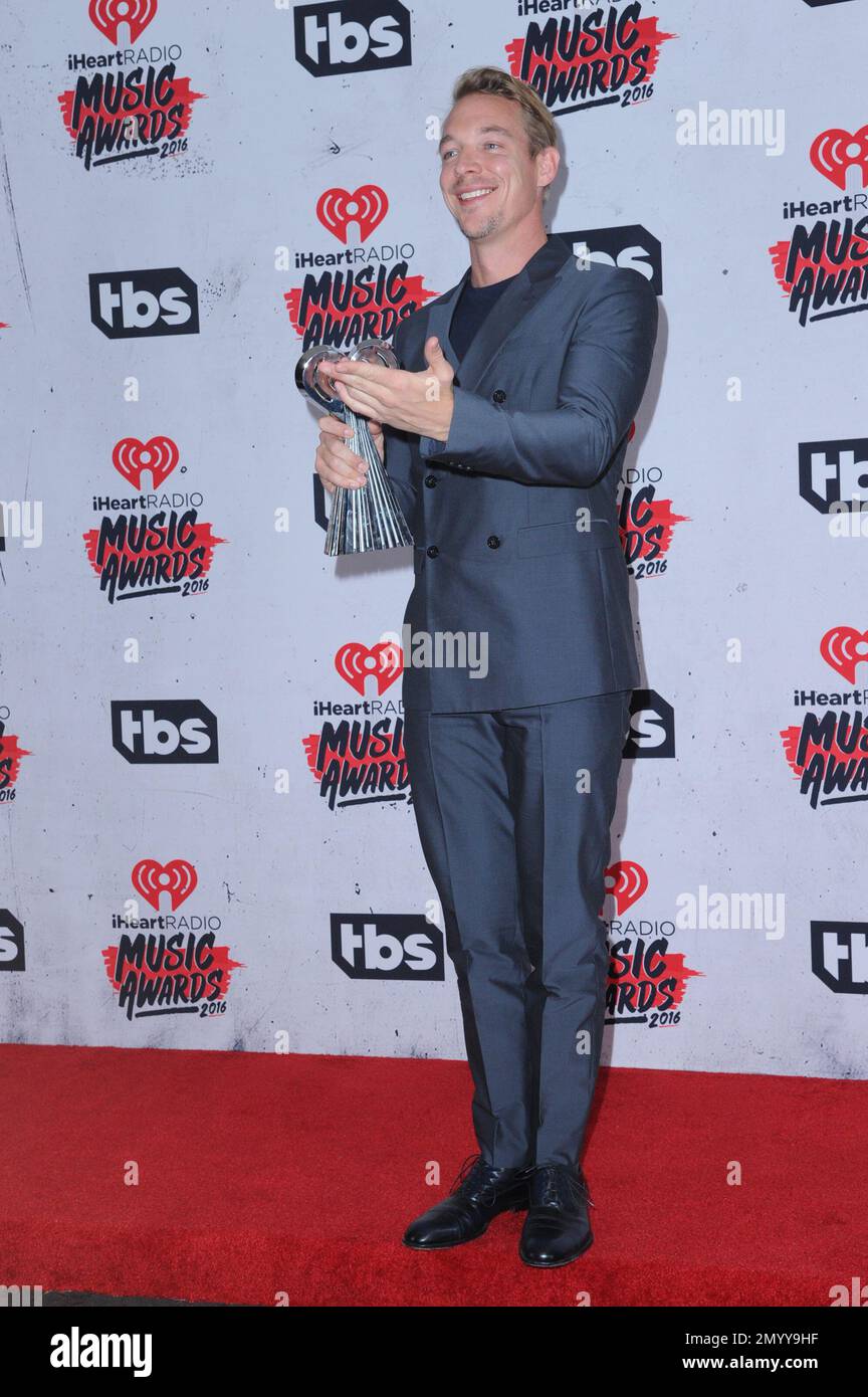Diplo poses in the press room with the award for dance song of the year ...