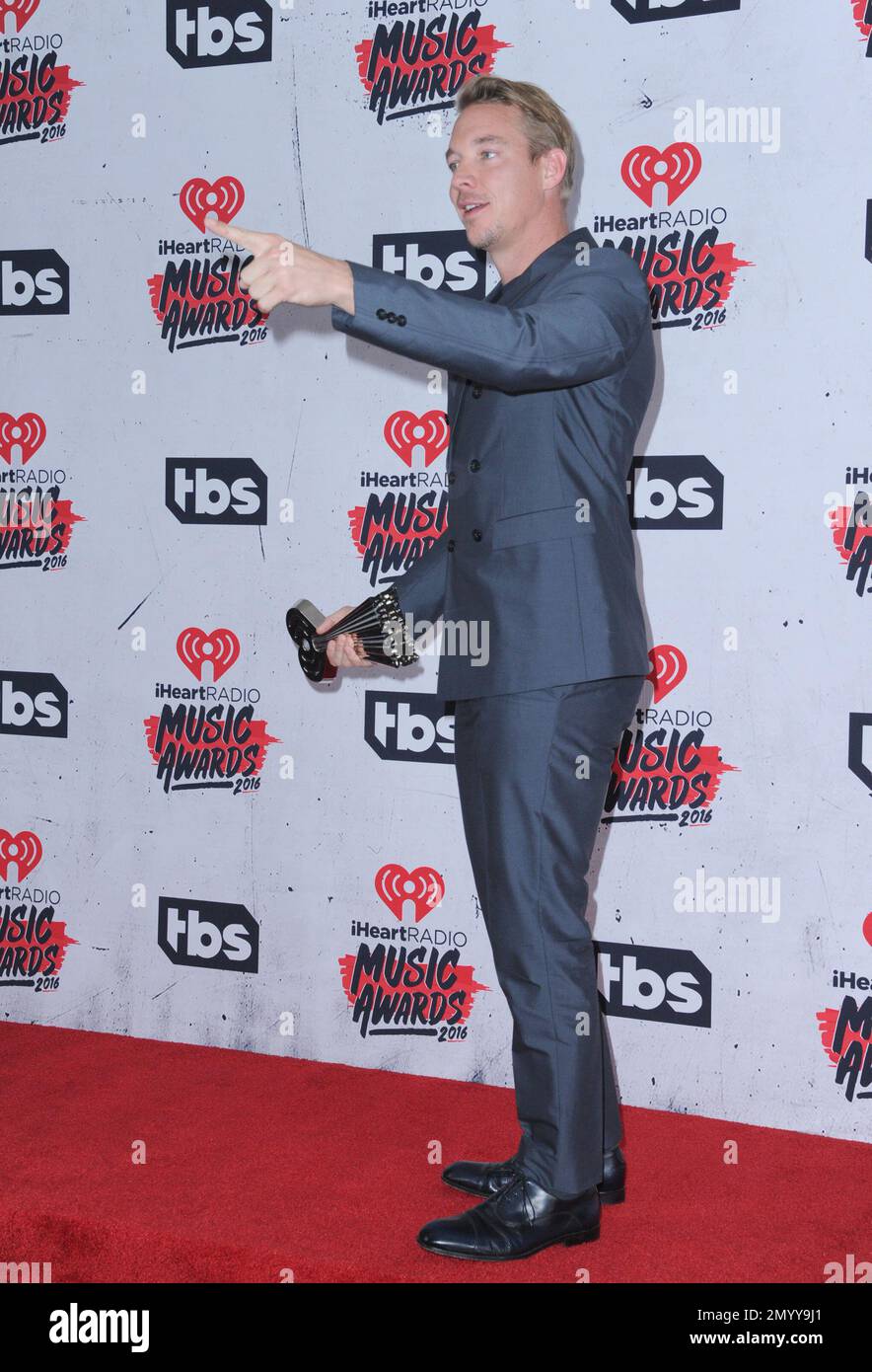 Diplo poses in the press room with the award for dance song of the year ...