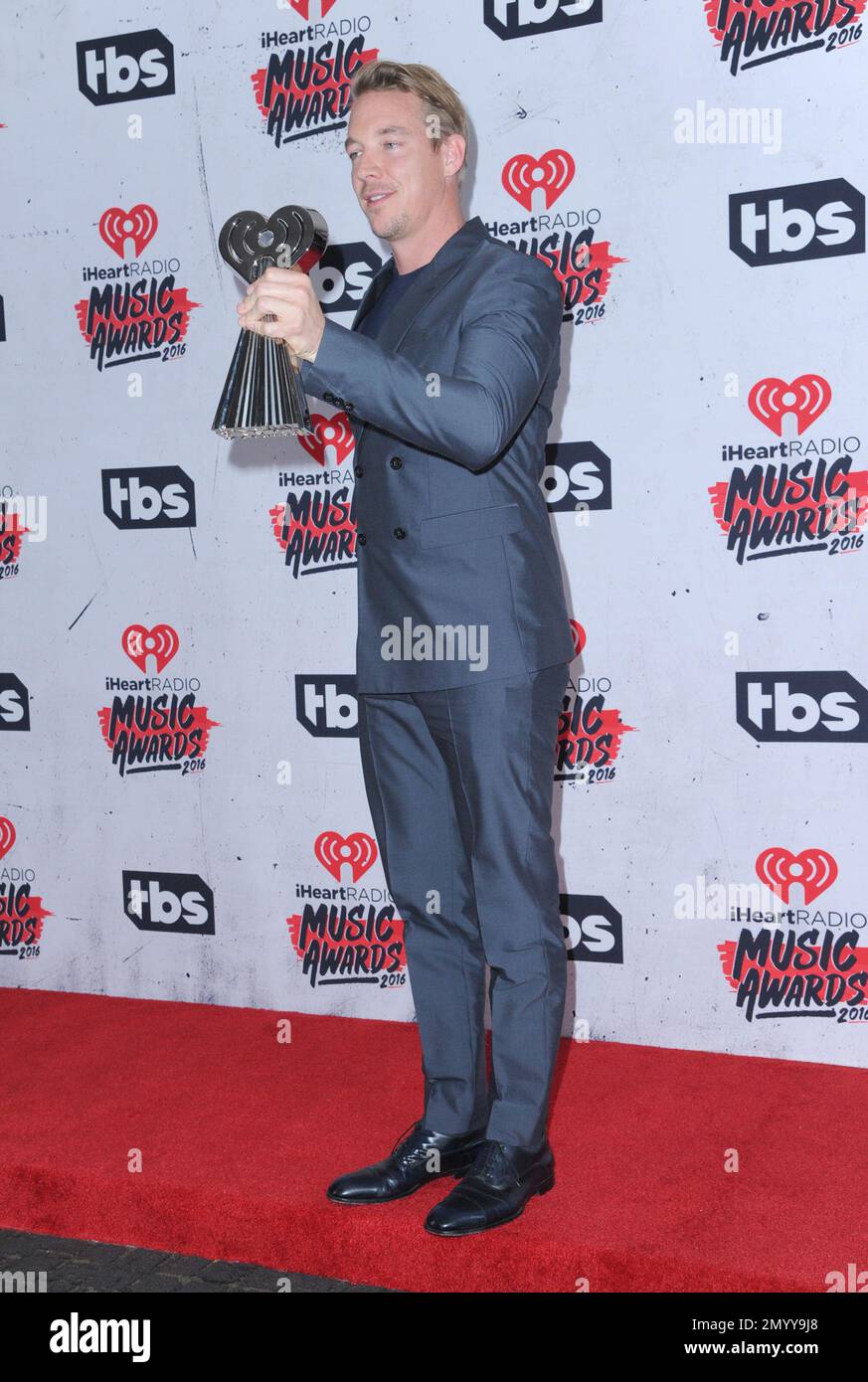 Diplo poses in the press room with the award for dance song of the year ...
