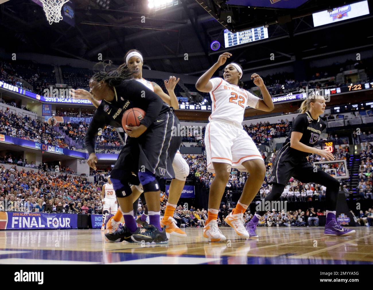 Washington's Chantel Osahor (0) grabs a rebound against Syracuse center ...