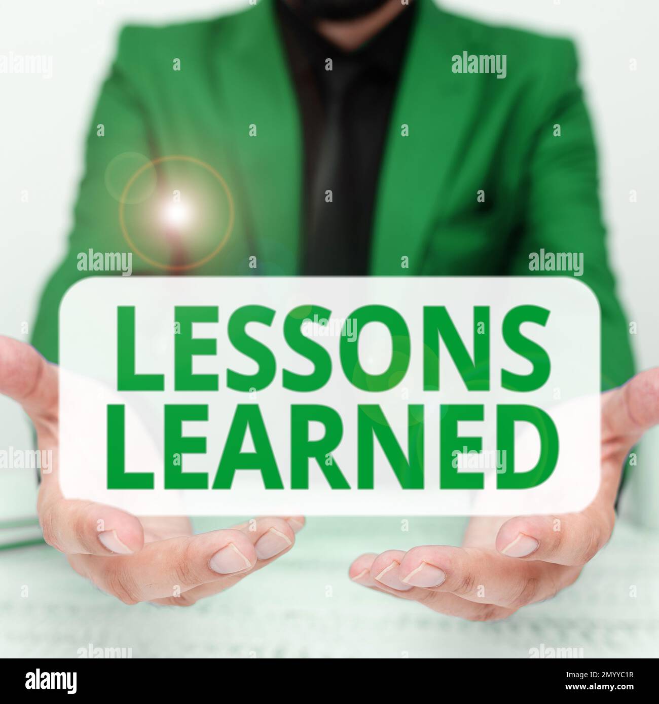 Hand writing sign Lessons Learned. Business concept Promote share and use knowledge derived from ...