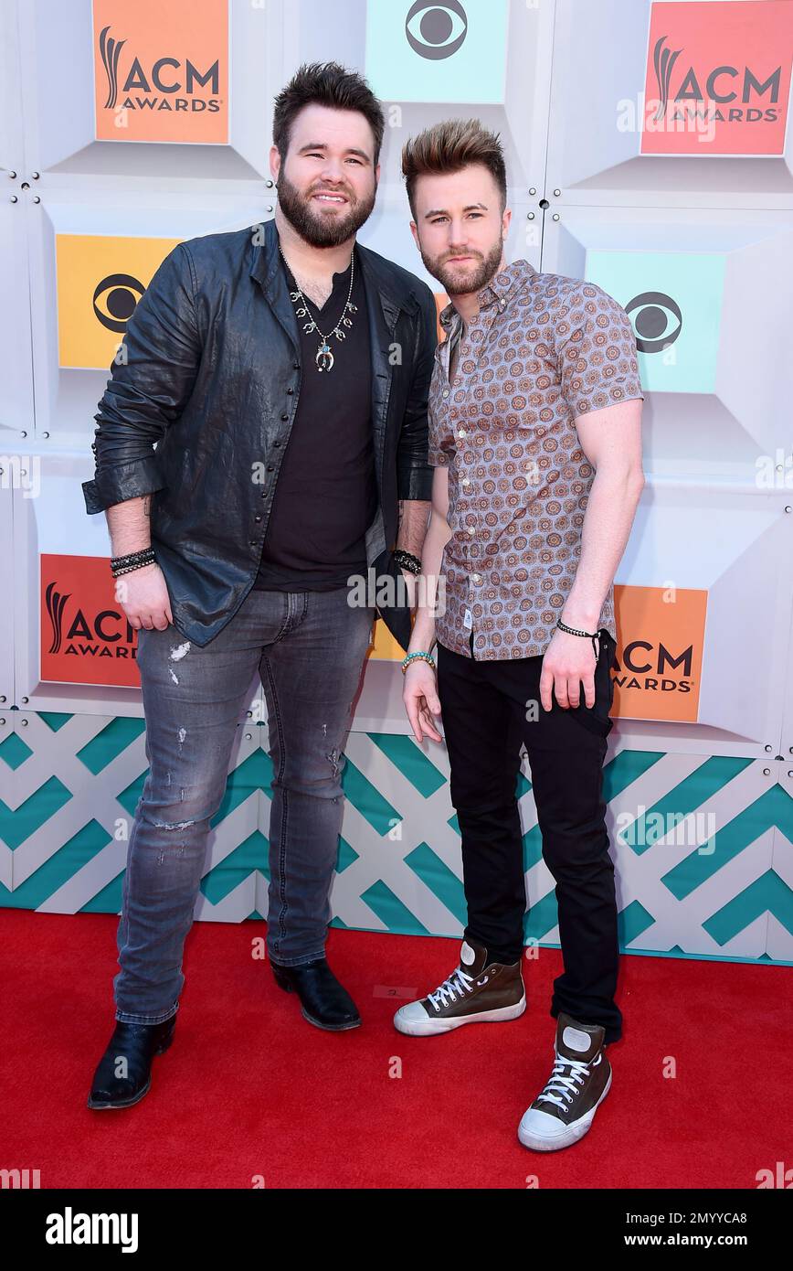 Zach Swon, left, and Colton Swon, of The Swon Brothers, arrive at the ...
