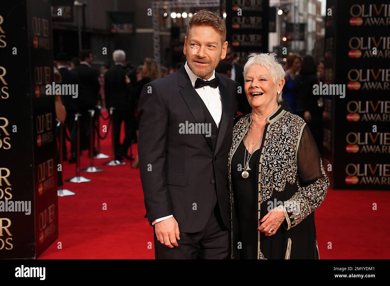 Actors Kenneth Branagh, left, and Dame Judi Dench poses for ...
