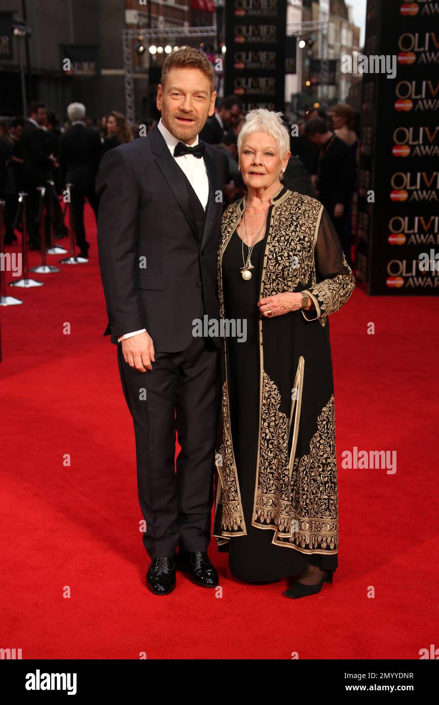Actors Kenneth Branagh, left, and Dame Judi Dench poses for ...
