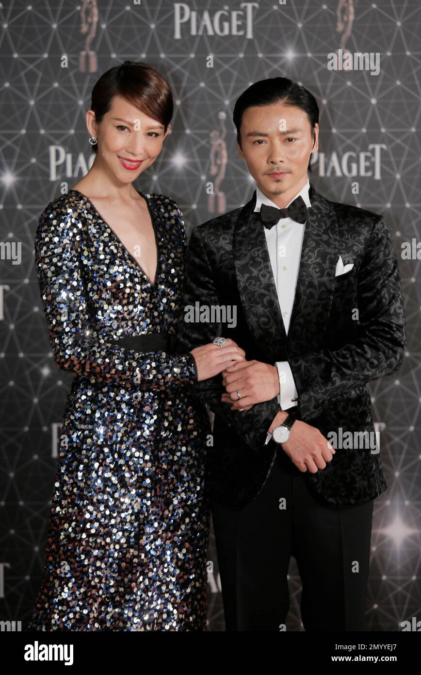 Chinese actor Zhang Jin and his wife Hong Kong actress Ada Choi pose on the red carpet of the ...