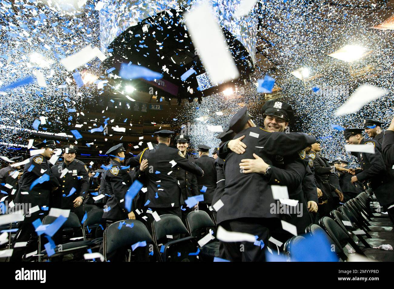 New police officers embrace at the end of the New York City Police ...