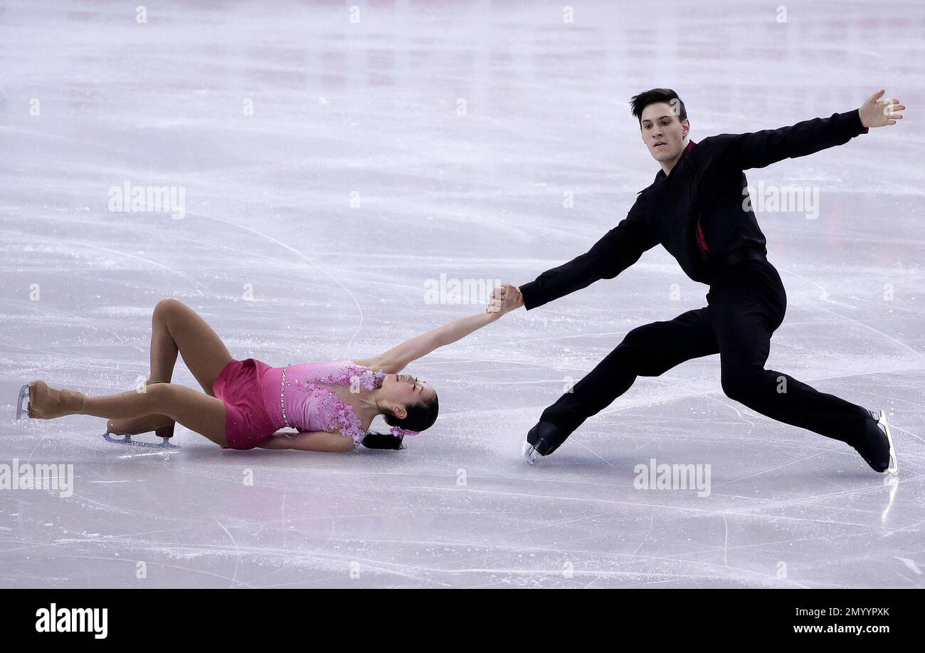 Sumire Suto and Francis Boudreau-Audet, of Japan, compete during the ...