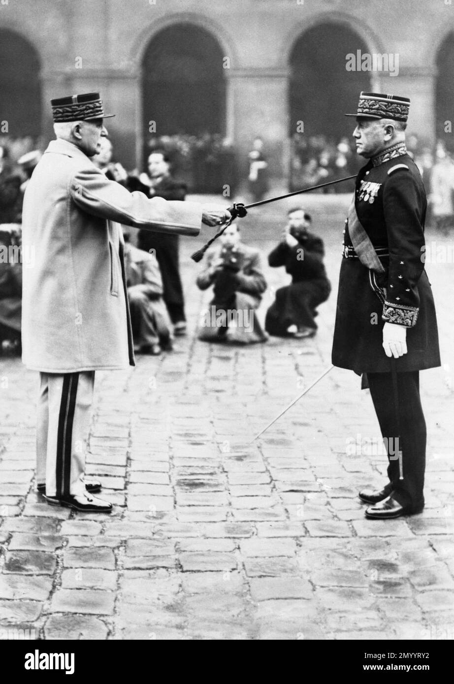 Marshal Petain, left, remitting the military medal to General Gamelin ...