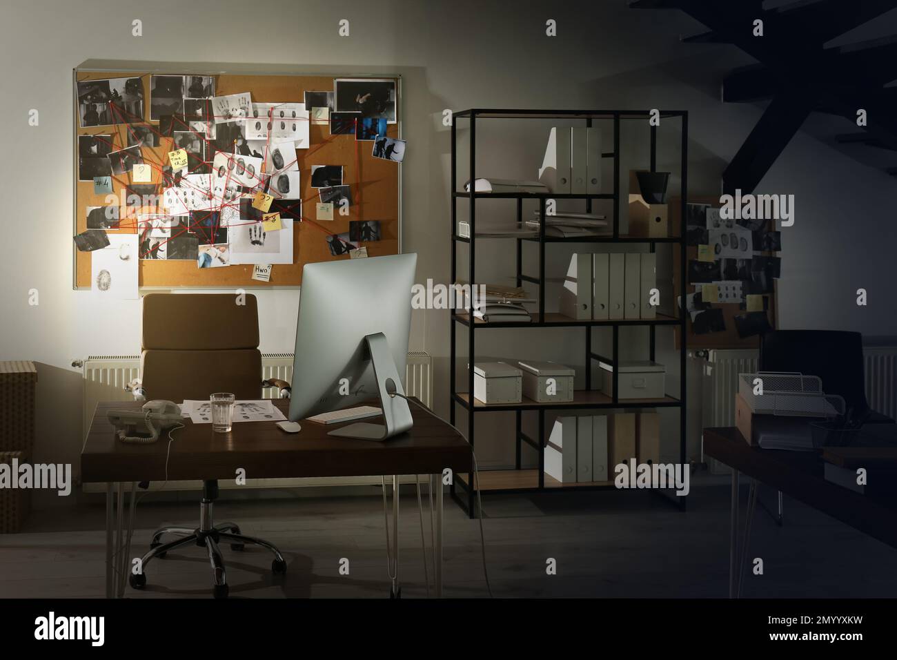 Modern detective office with computer and board Stock Photo - Alamy