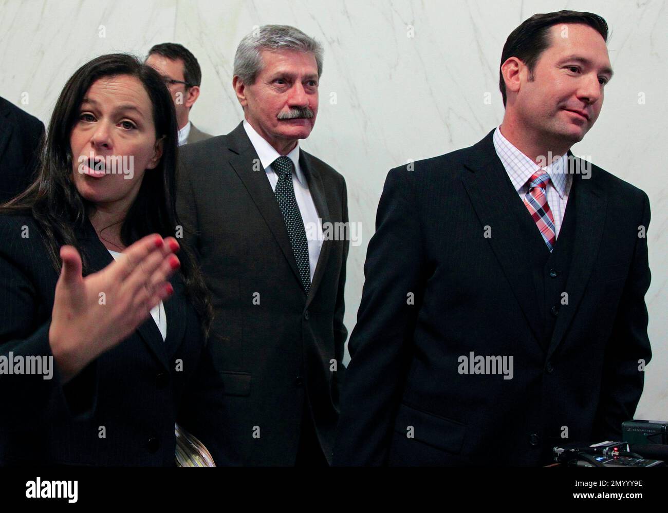 In this Aug. 14, 2013 photo, attorneys for Dr. Anthony Garcia, Alison ...
