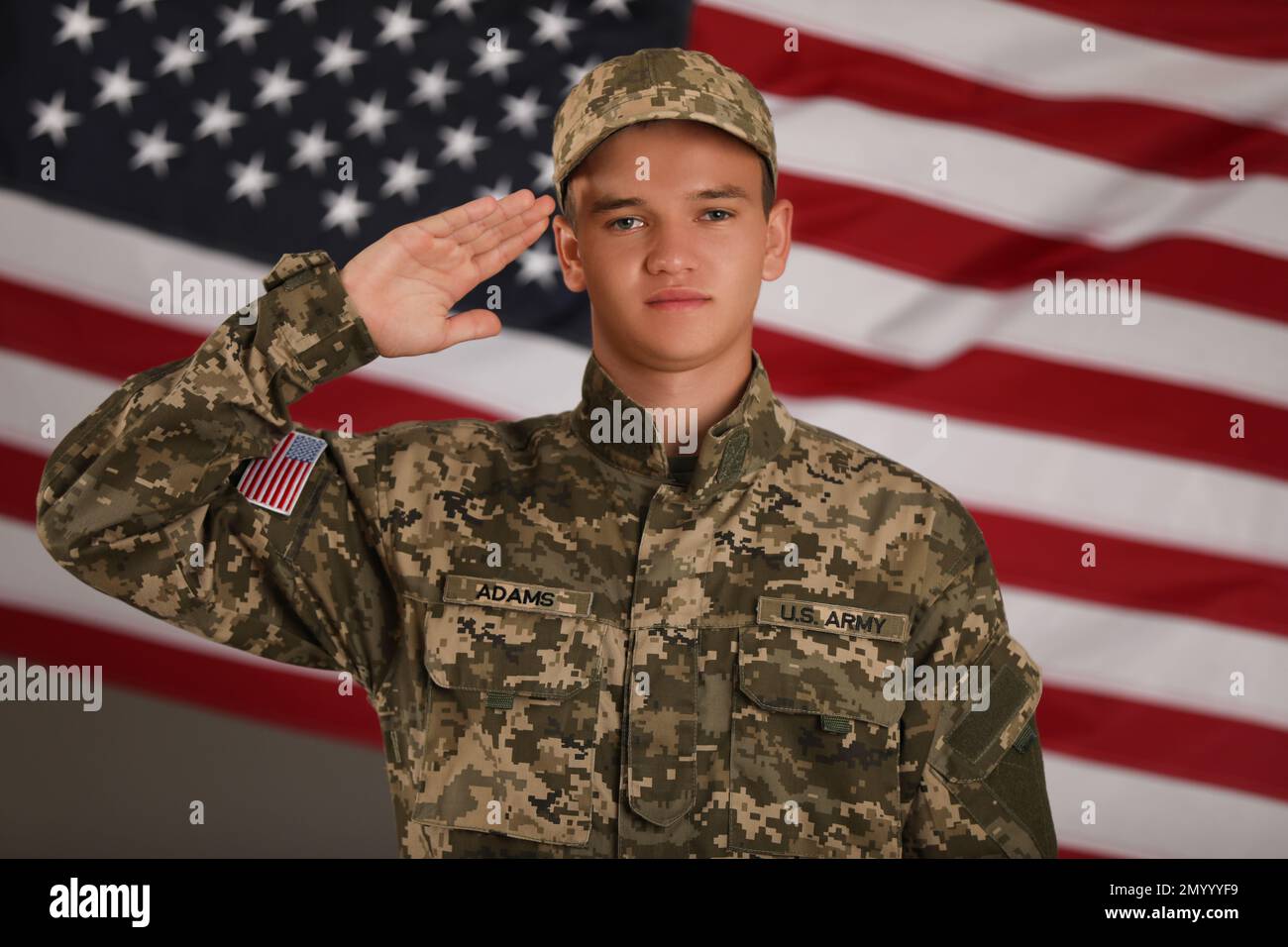 Saluting the american flag hi-res stock photography and images - Alamy