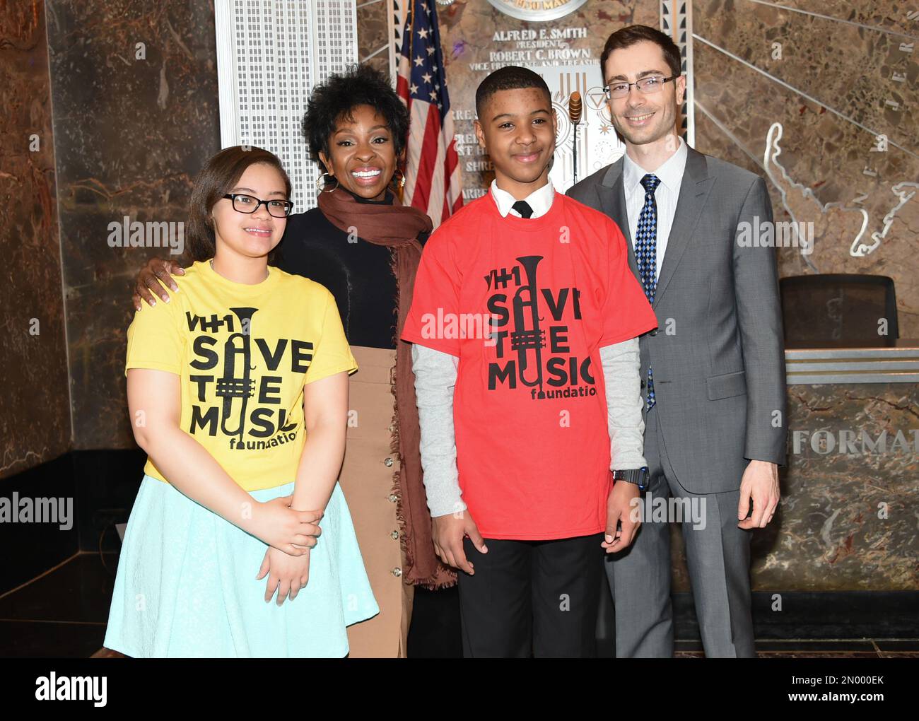Singer Gladys Knight, center, lights the Empire State Building with ...
