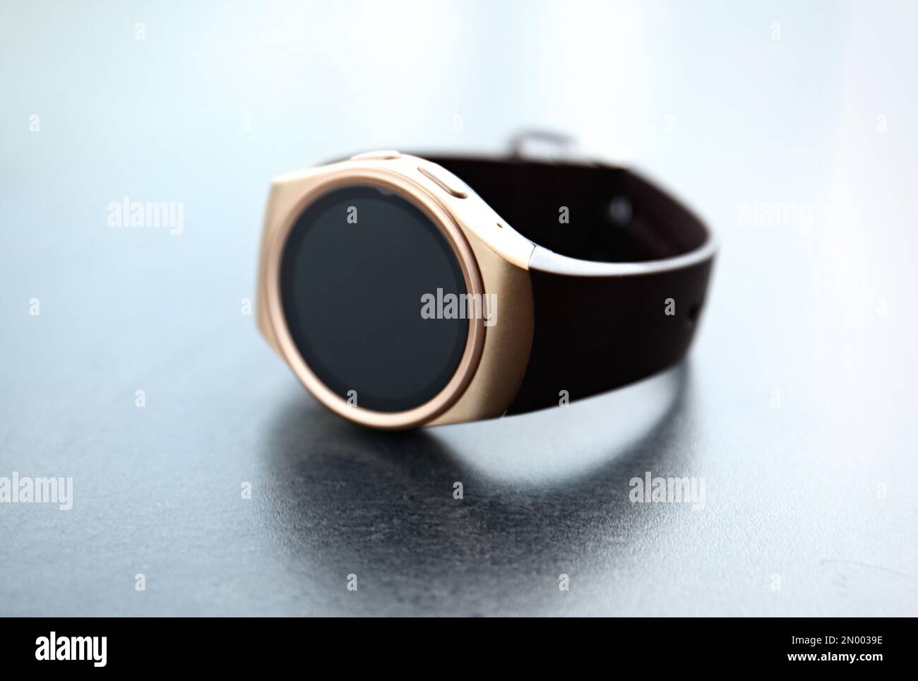 Modern stylish smart watch on grey table, closeup Stock Photo - Alamy