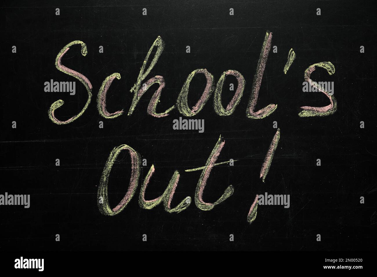 Text SCHOOL'S OUT written on blackboard. Summer holidays Stock Photo ...