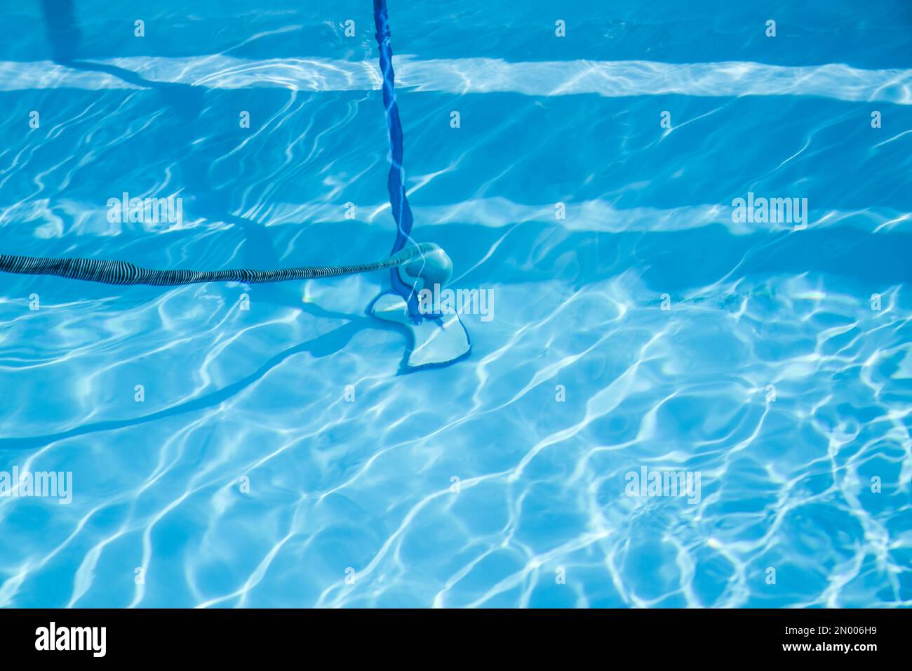 Pool vacuuming hi-res stock photography and images - Alamy