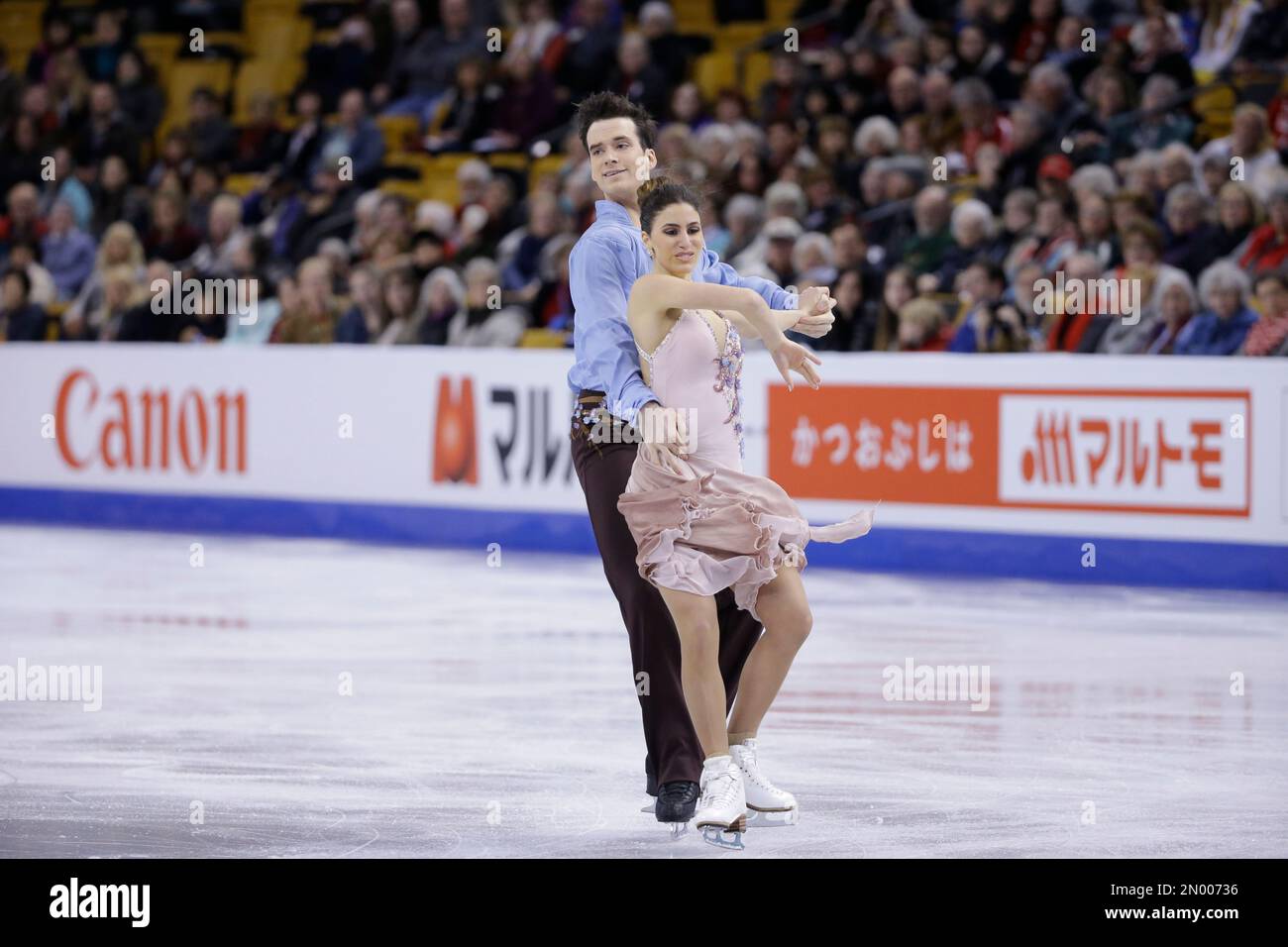 Tina Garabedian and Simon Proulx-Senecal, of Armenia, compete during ...
