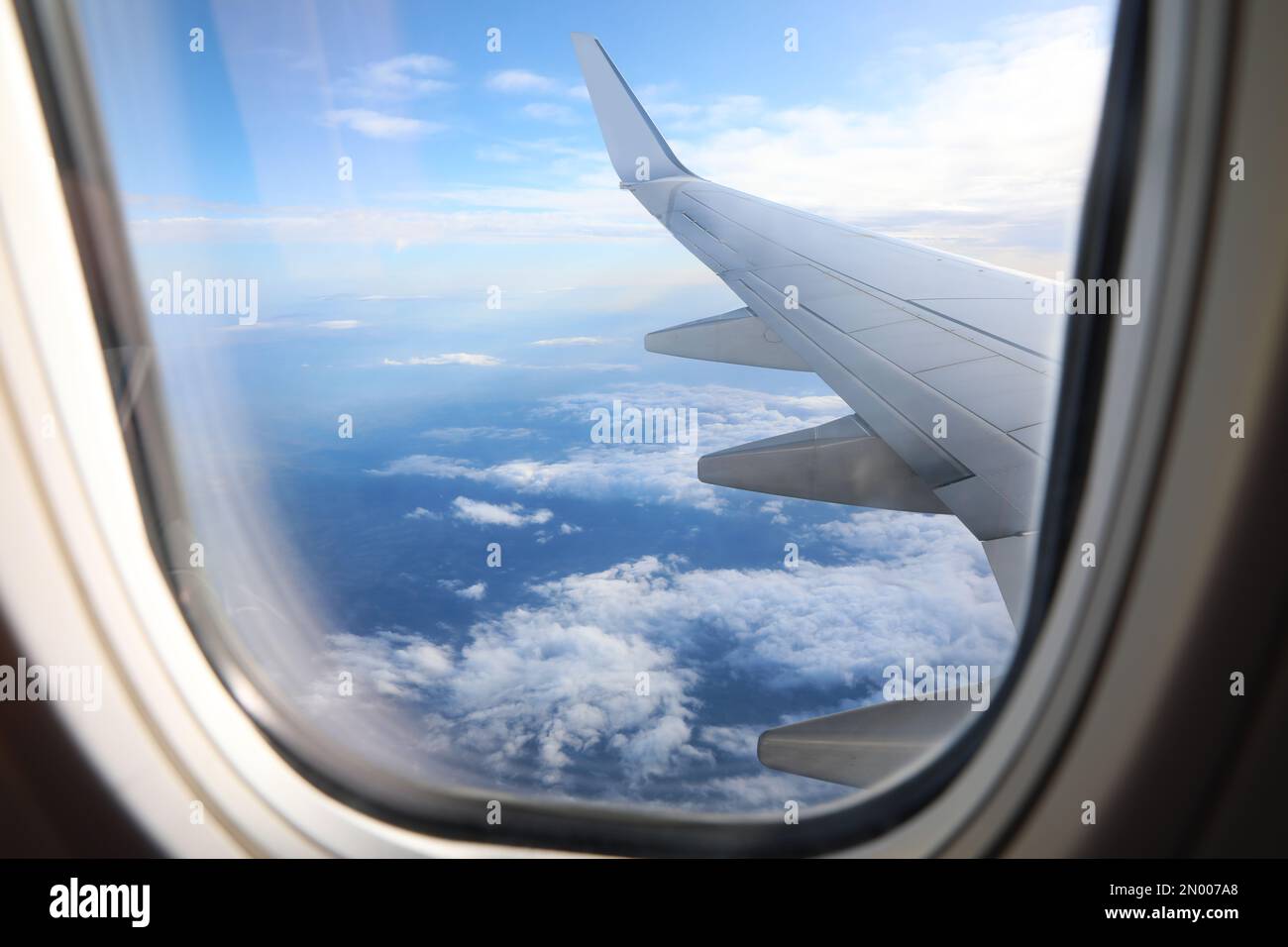 Beautiful view through plane window during flight. Air travel Stock ...