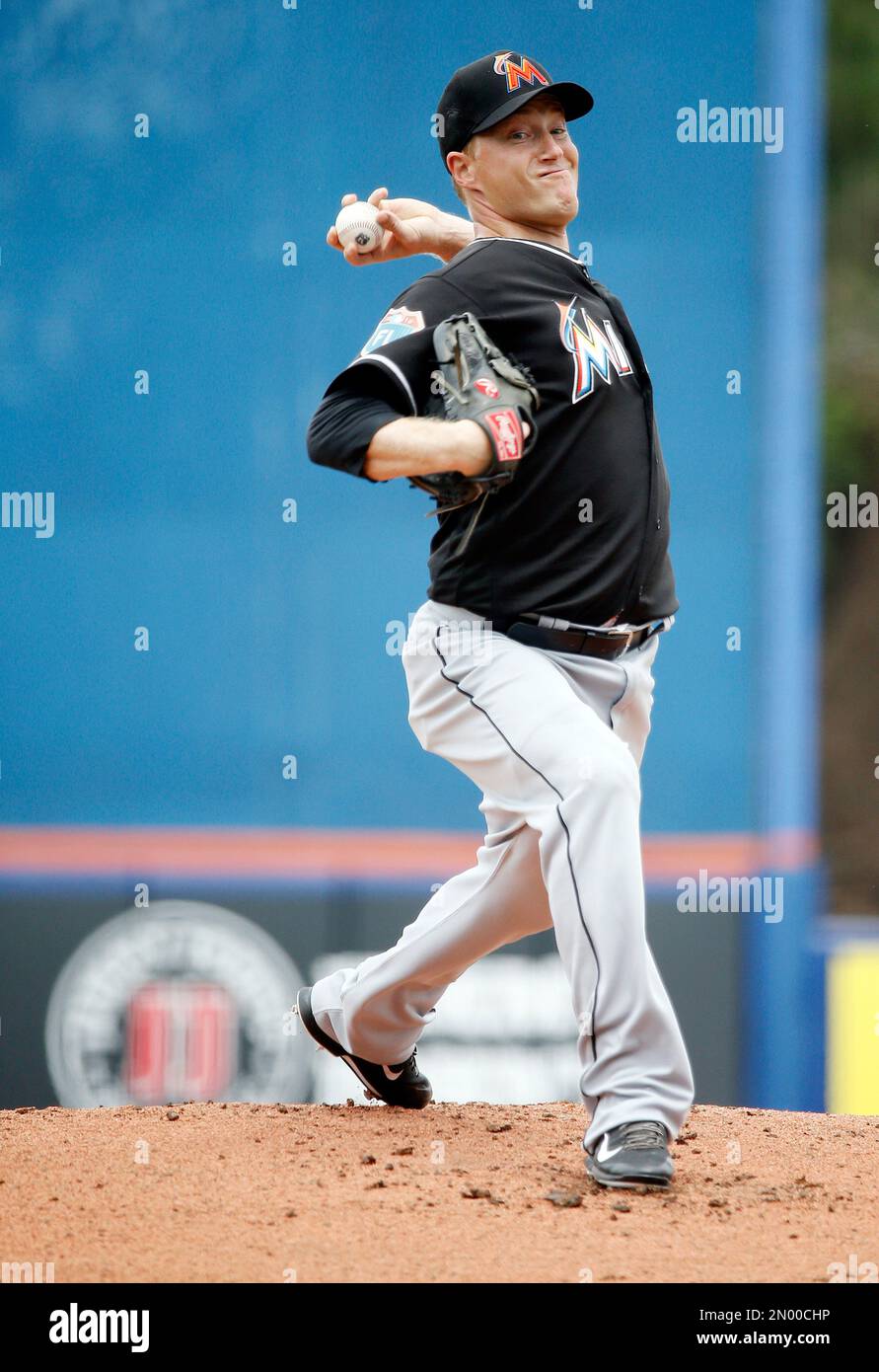Miami Marlins starting pitcher Chris Narveson throws during the first ...