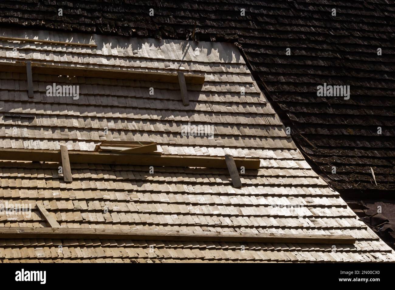 Roof construction site. Removal of old roof, replacement with new ...