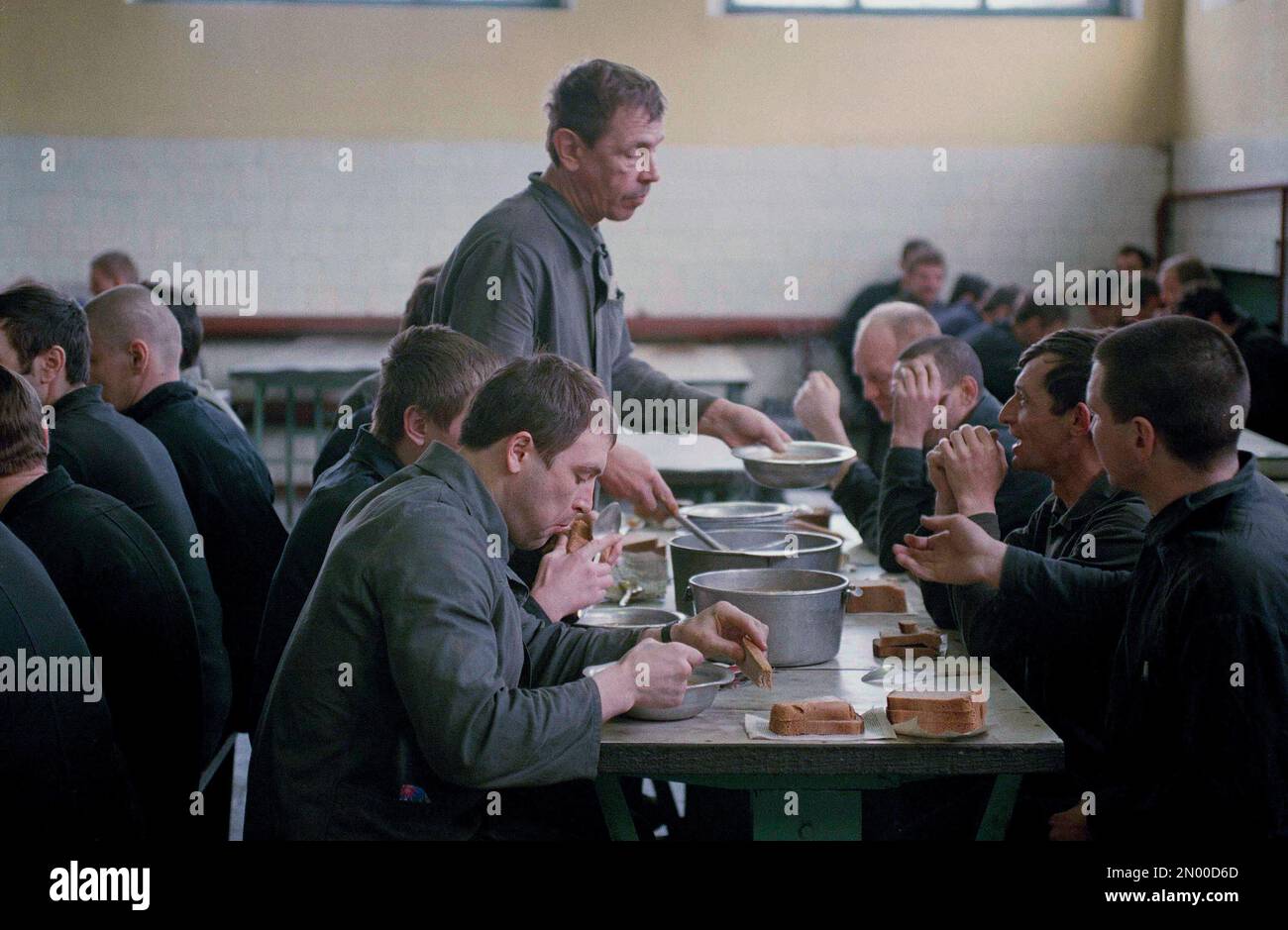 Russian inmates eat soup and bread during lunch at the canteen of the ...