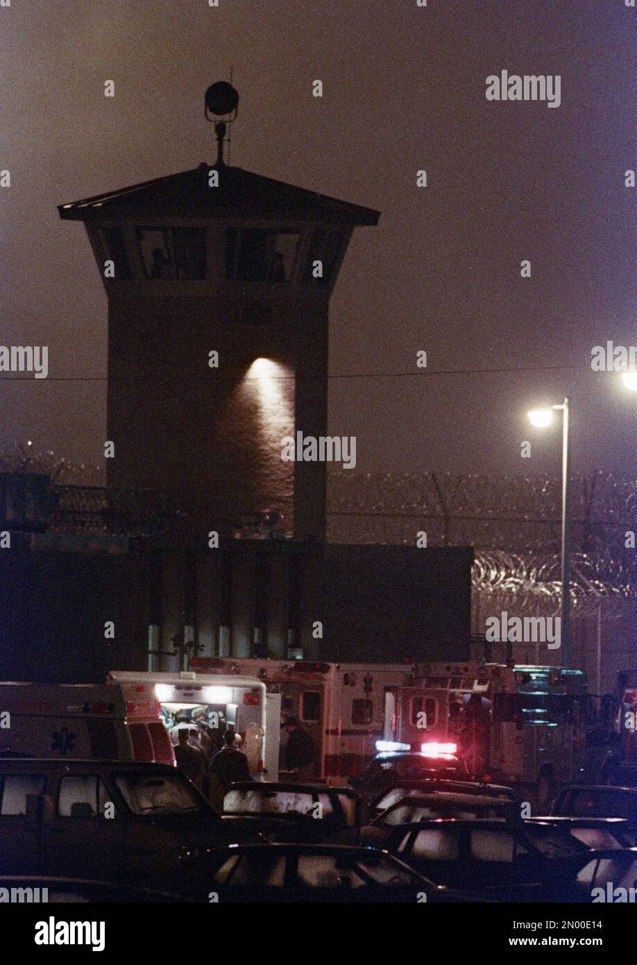 A released hostage is loaded into an ambulance beneath a guard tower at ...