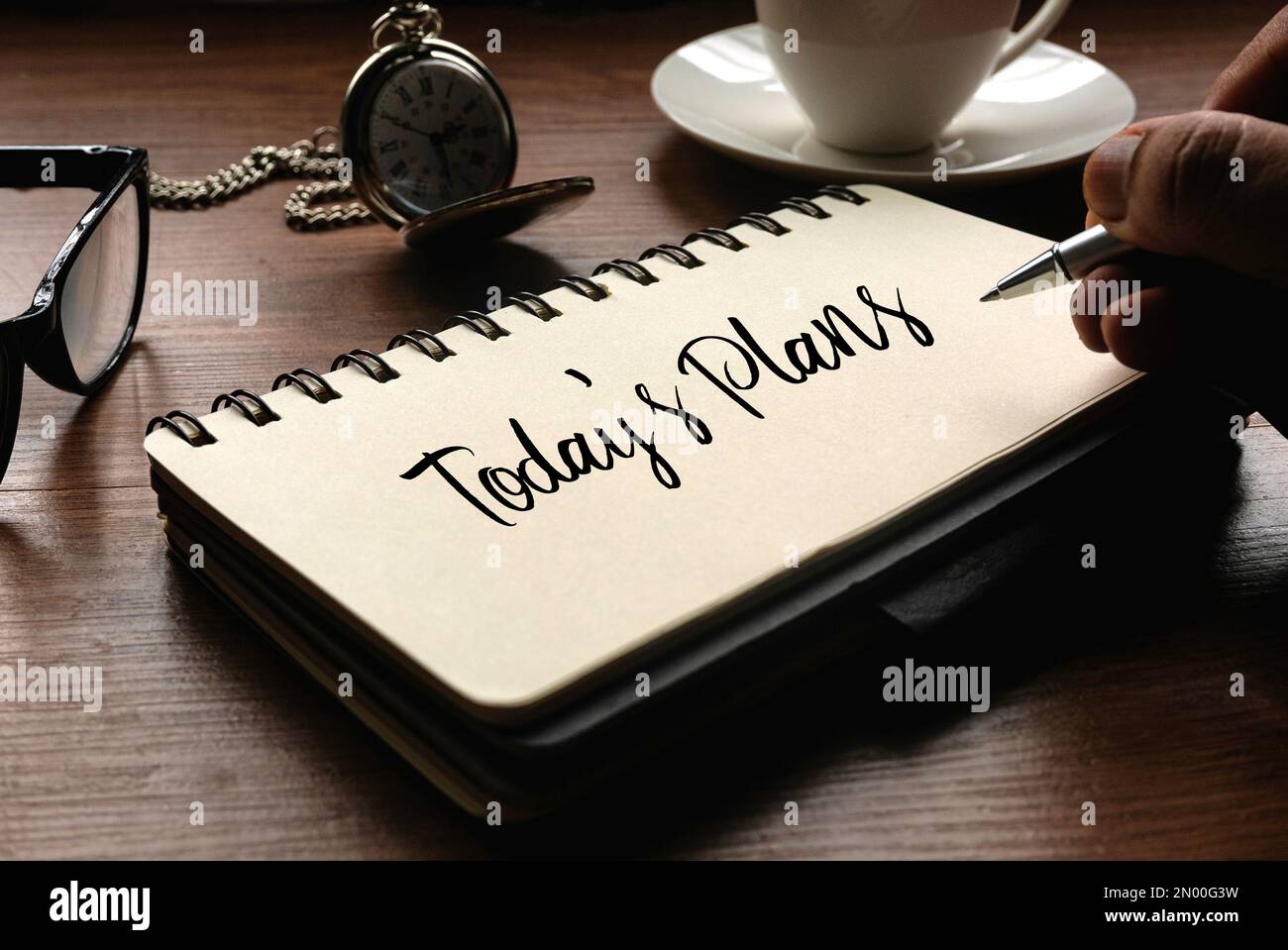 Hand writing Today's Plan on a notebook Stock Photo - Alamy