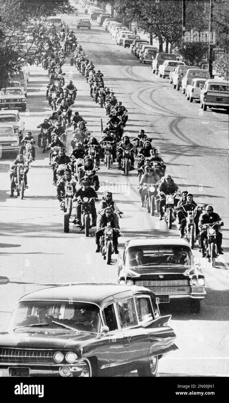 An estimated 200 Hells Angels provides a funeral escort for the body of ...