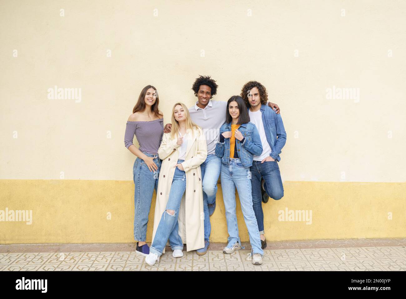 Multi-ethnic group of friends posing while having fun and laughing ...