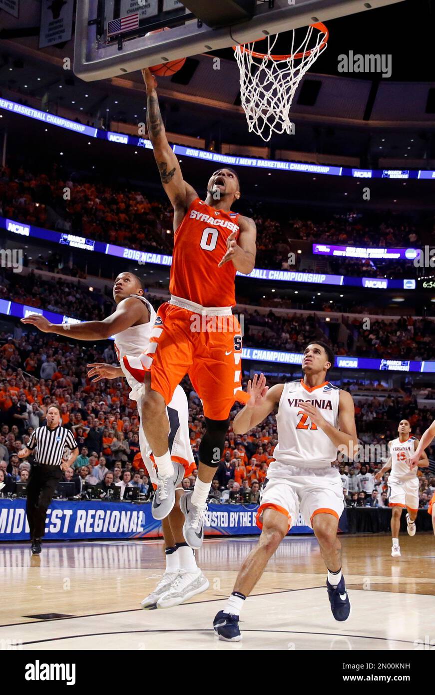 Syracuse's Michael Gbinije (0) goes up for a basket during the second ...