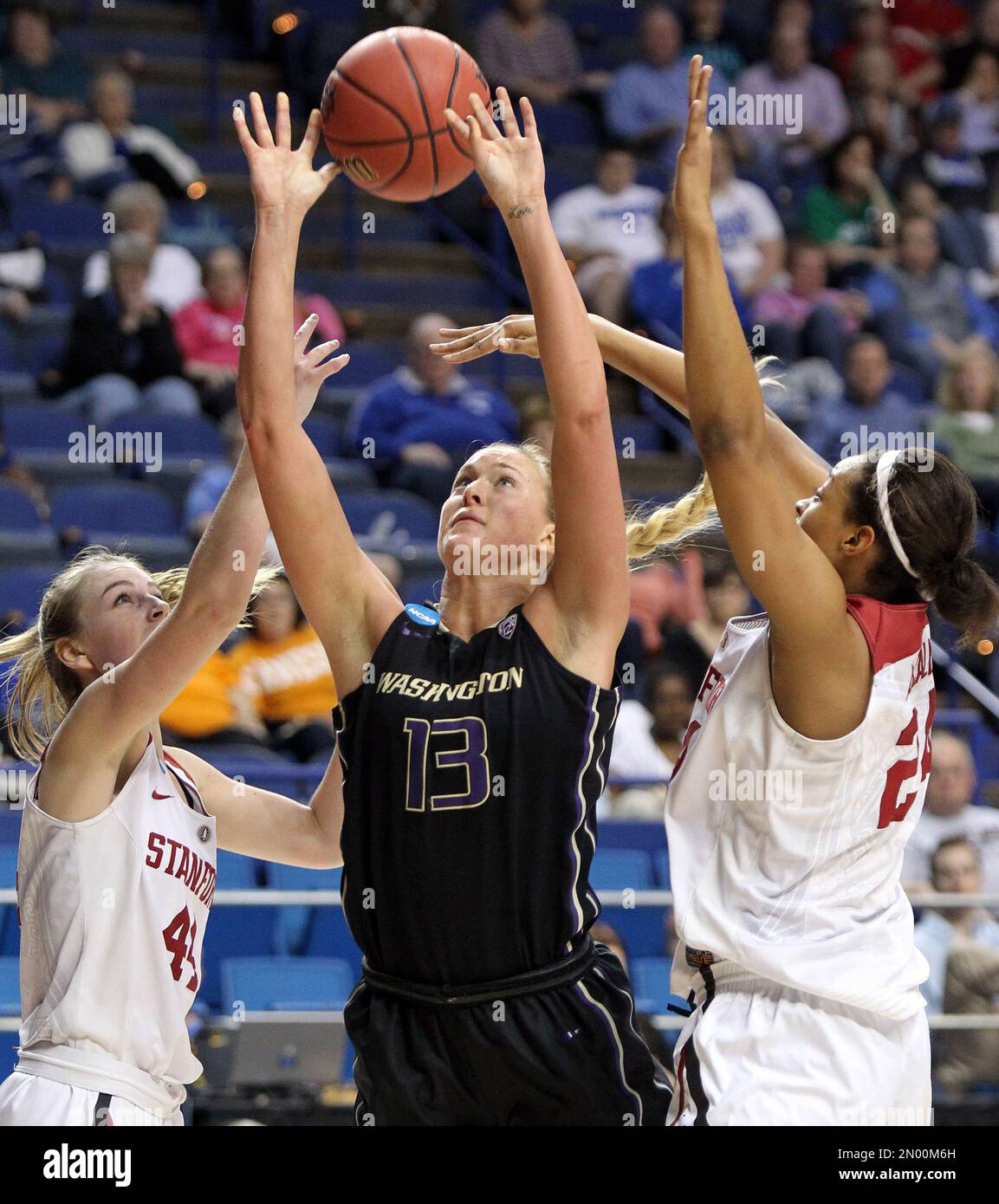 Washington's Katie Collier (13) shoots between Stanford's Karlie ...