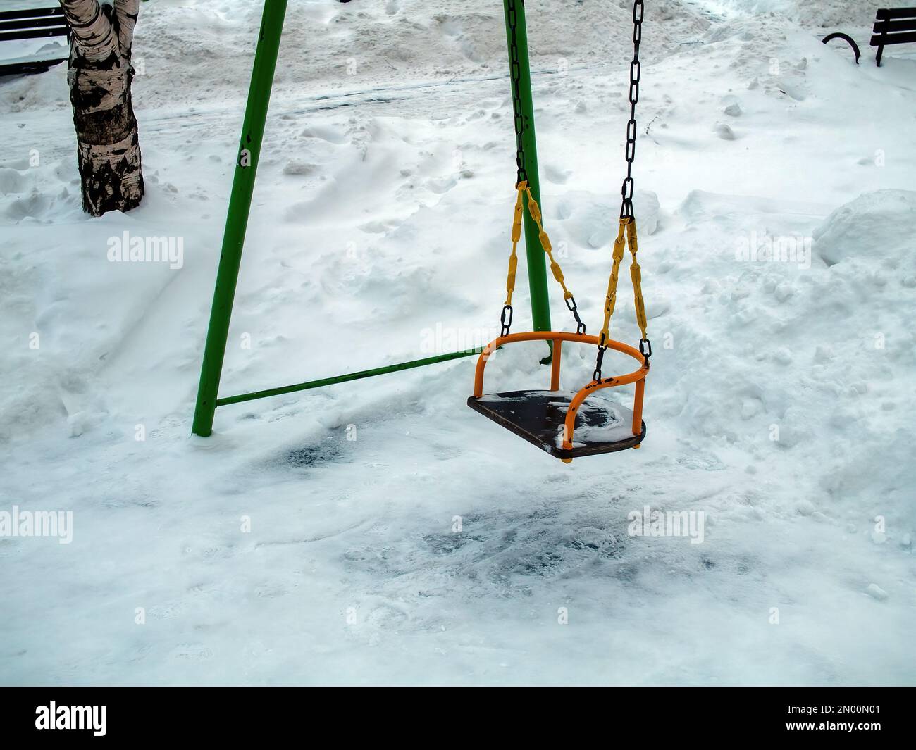 Children's playground in the snow, in winter Stock Photo - Alamy