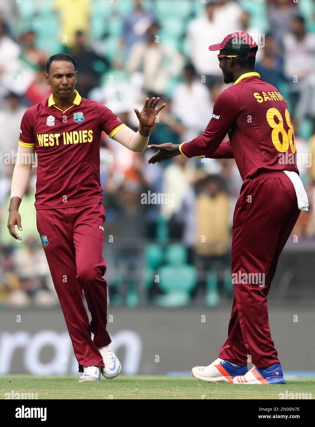 West Indies’ Samuel Badree, left, celebrates with captain Darren Sammy ...