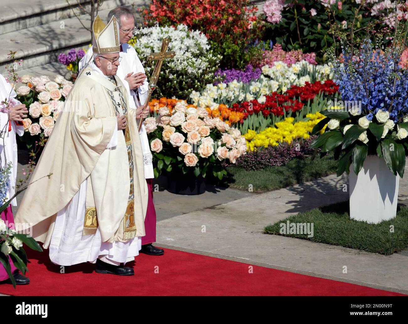 Pope Francis walks with his pastoral staff as he celebrates the Easter ...
