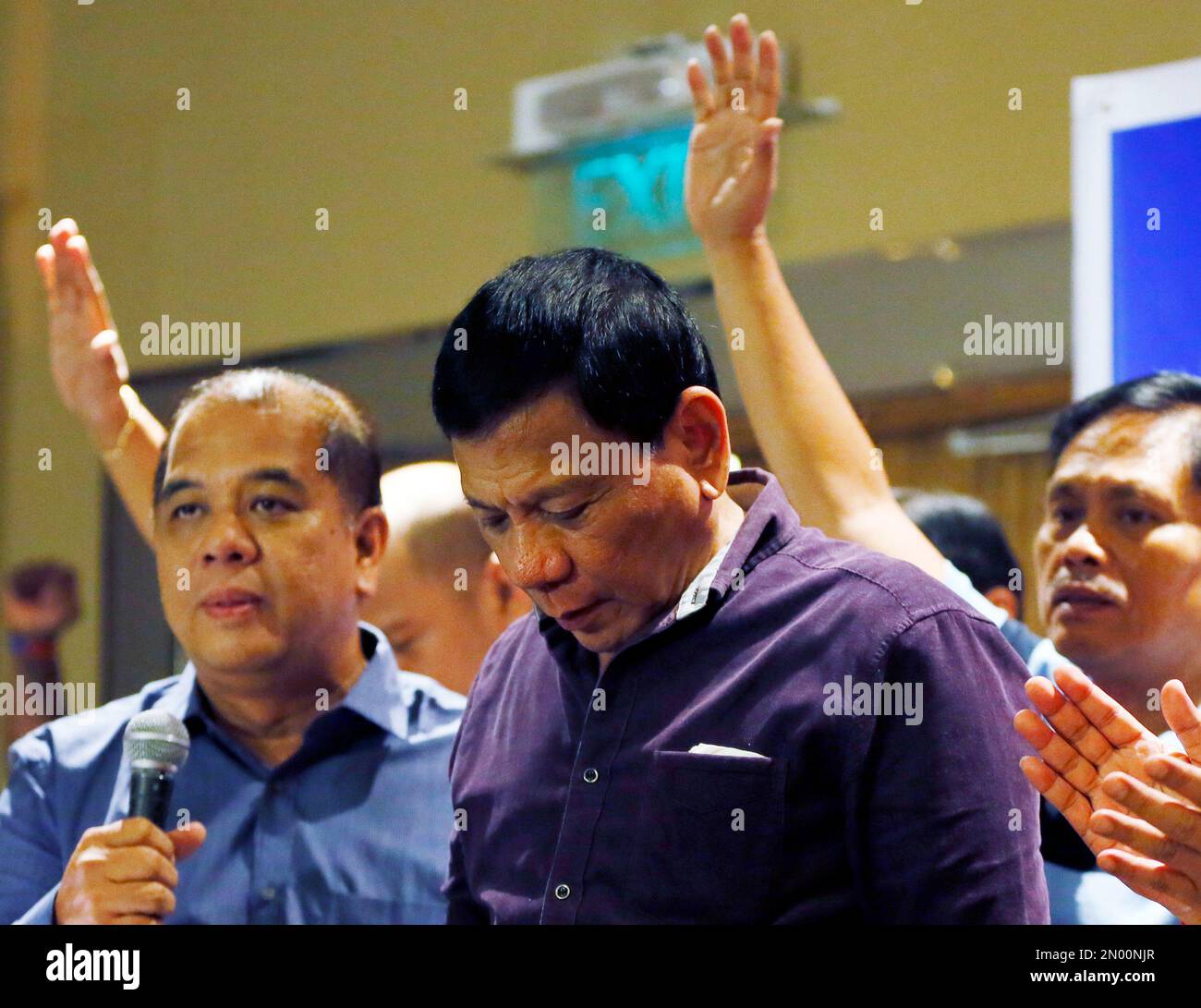 In this Nov.30, 2015 photo, Davao City Mayor Rodrigo Duterte is prayed ...