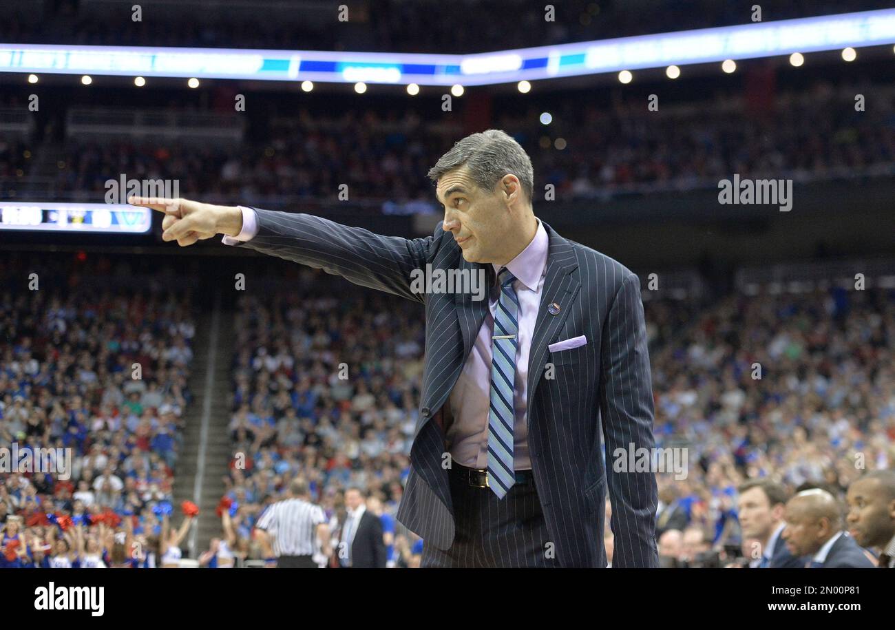 Villanova head coach Jay Wright speaks to players against Kansas during ...
