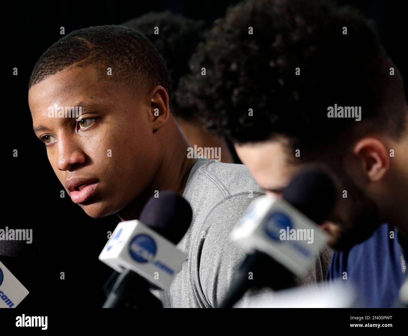 Virginia guard Devon Hall answers a question at a news conference on ...