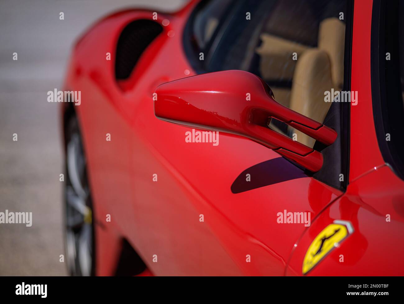 Calafat, Spain, April 18, 2021: Detail of a rearview mirror of a red ...