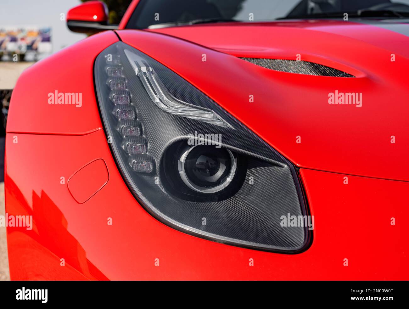 Calafat, Spain, April 18, 2021: detail of the front optics of a red ...