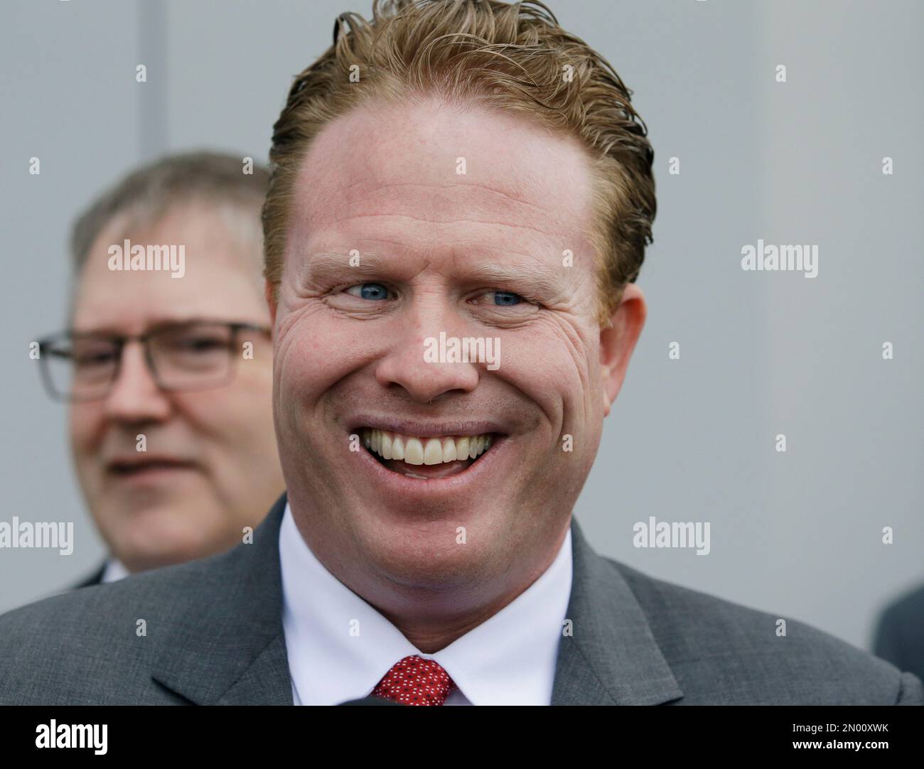 Utah businessman Jeremy Johnson speaks with reporters outside the ...