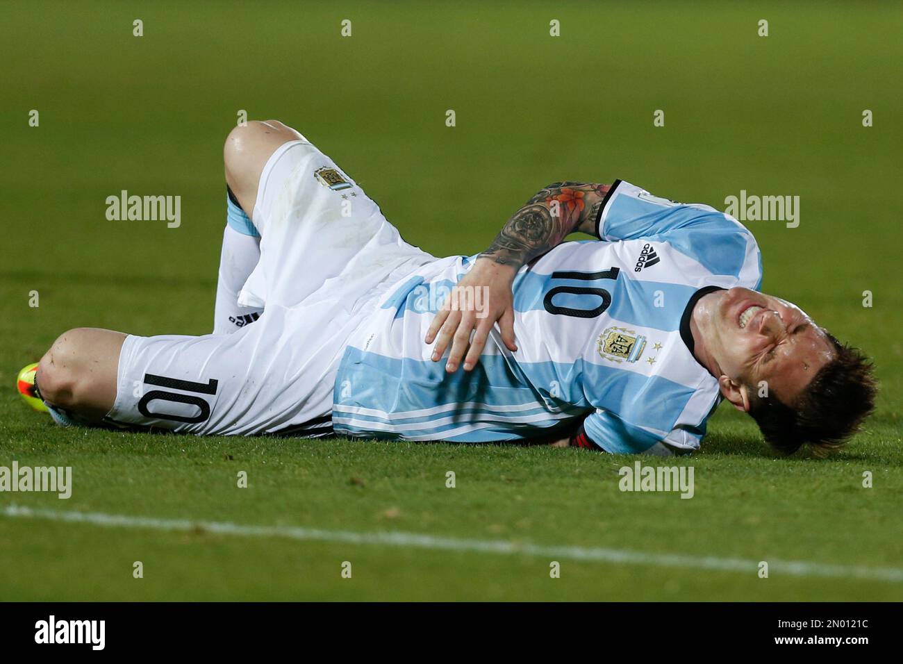 Argentina's Lionel Messi grimaces after being fouled during a 2018 ...