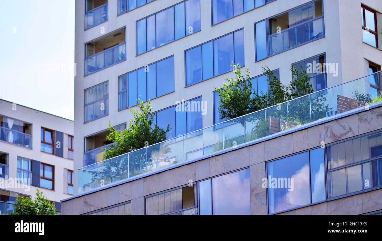 Modern residential building with new apartments in a green residential ...
