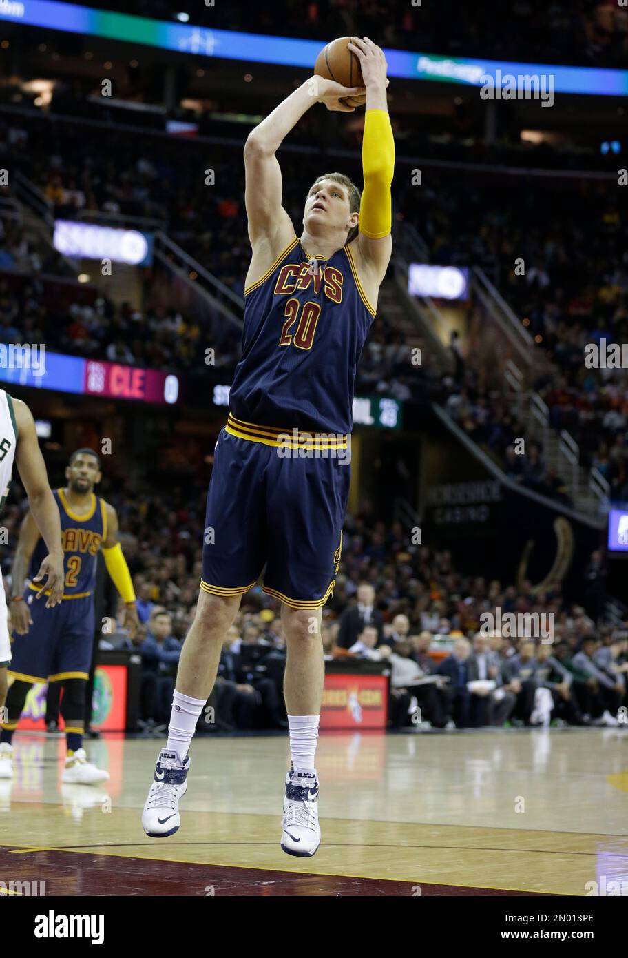 Cleveland Cavaliers' Timofey Mozgov, from Russia, shoots in the first half of an NBA basketball ...