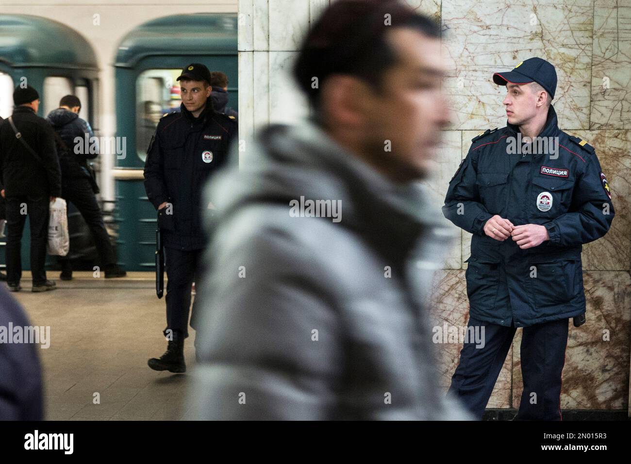 Police officers stay on guard in Moscow's subway, Russia, Thursday ...