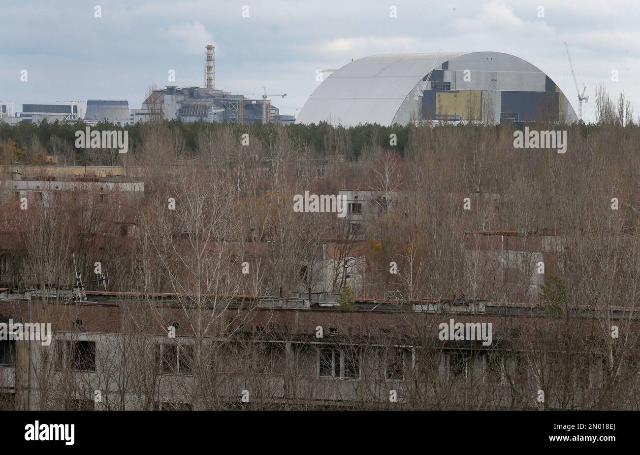 A chimney over the destroyed reactor at the Chernobyl nuclear power ...