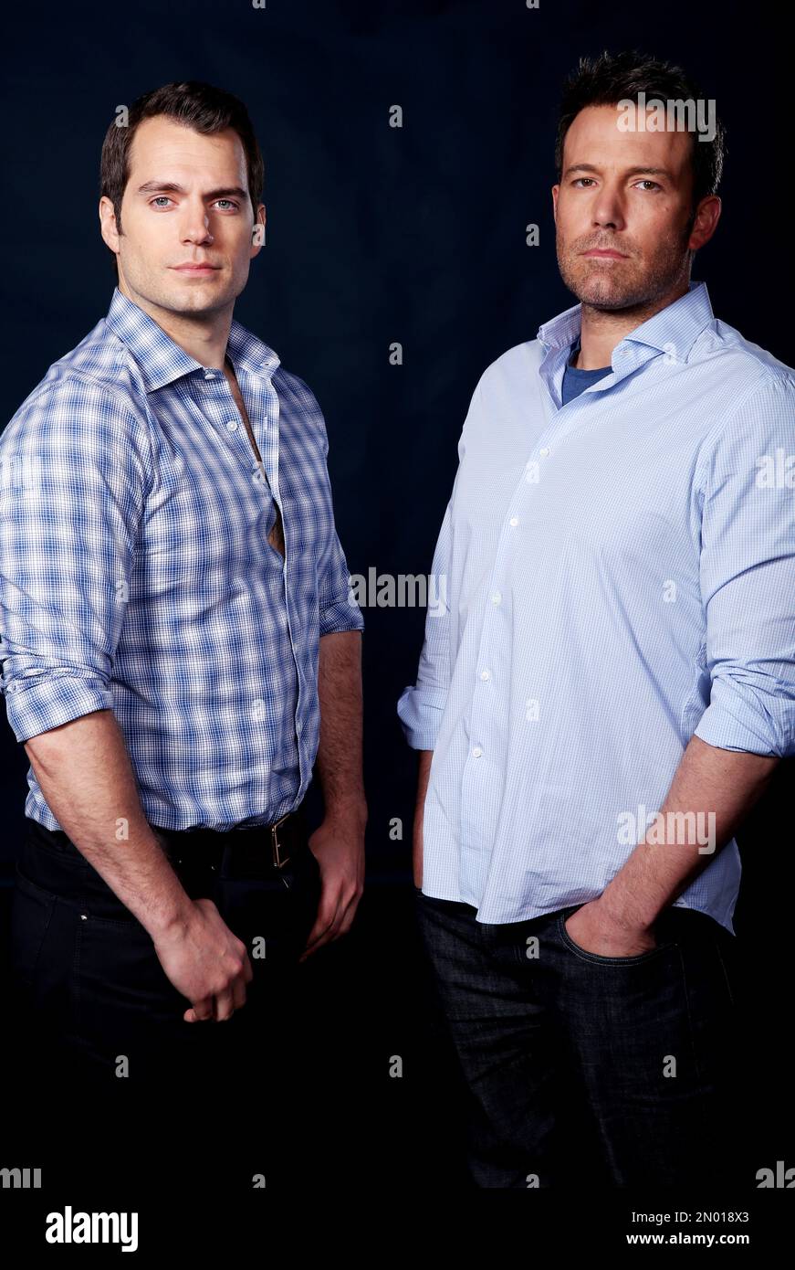 In this March 18, 2016 photo, Henry Cavill, left, and Ben Affleck pose ...