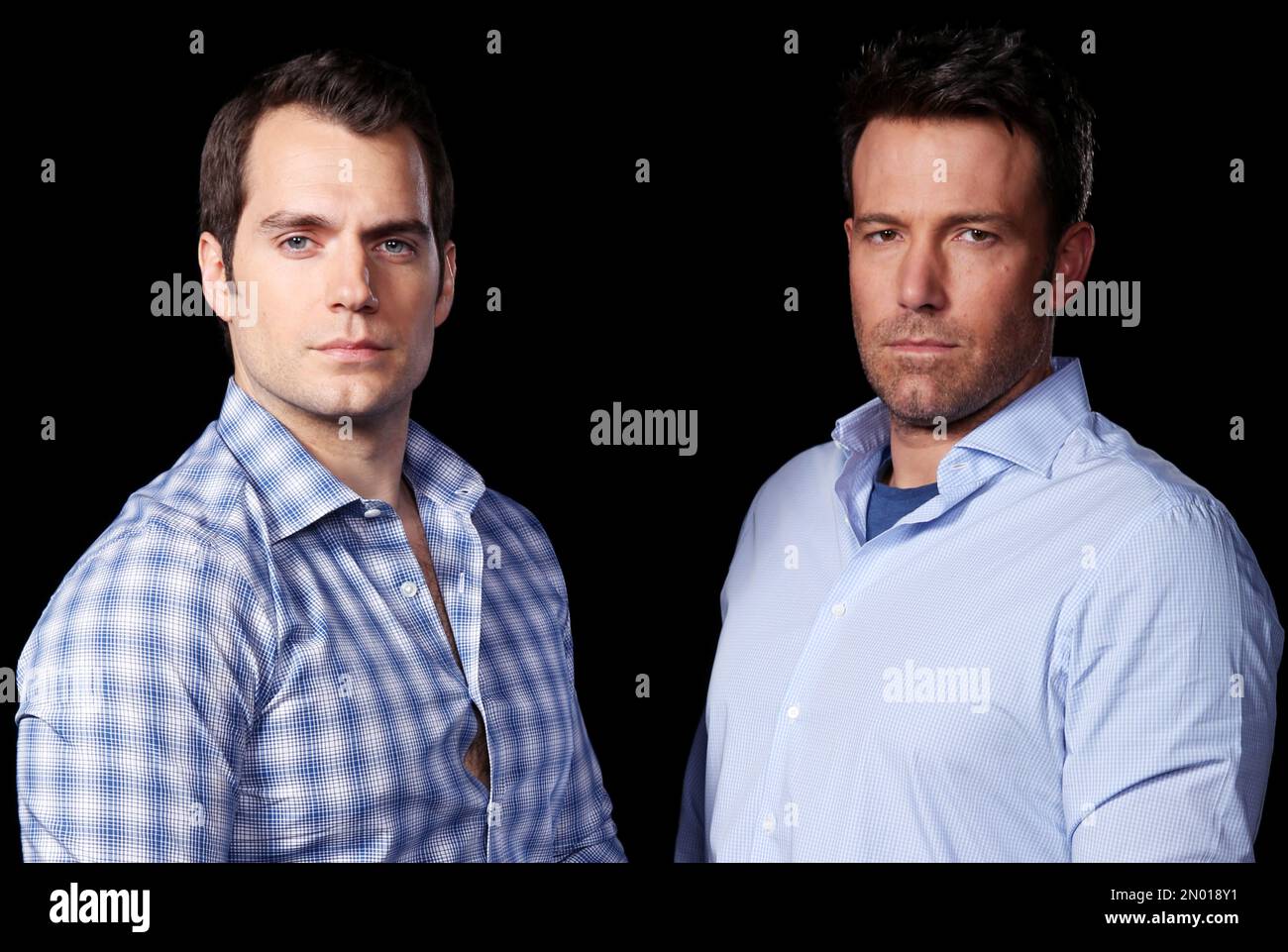 In this March 18, 2016 photo, Henry Cavill, left, and Ben Affleck pose ...